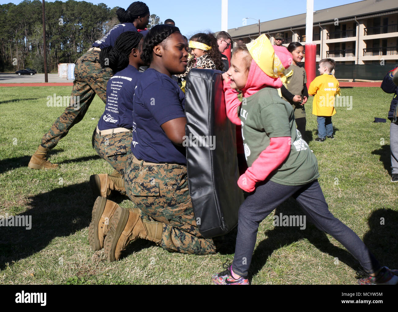 Children practice Marine Corps Martial Arts Program techniques during ...