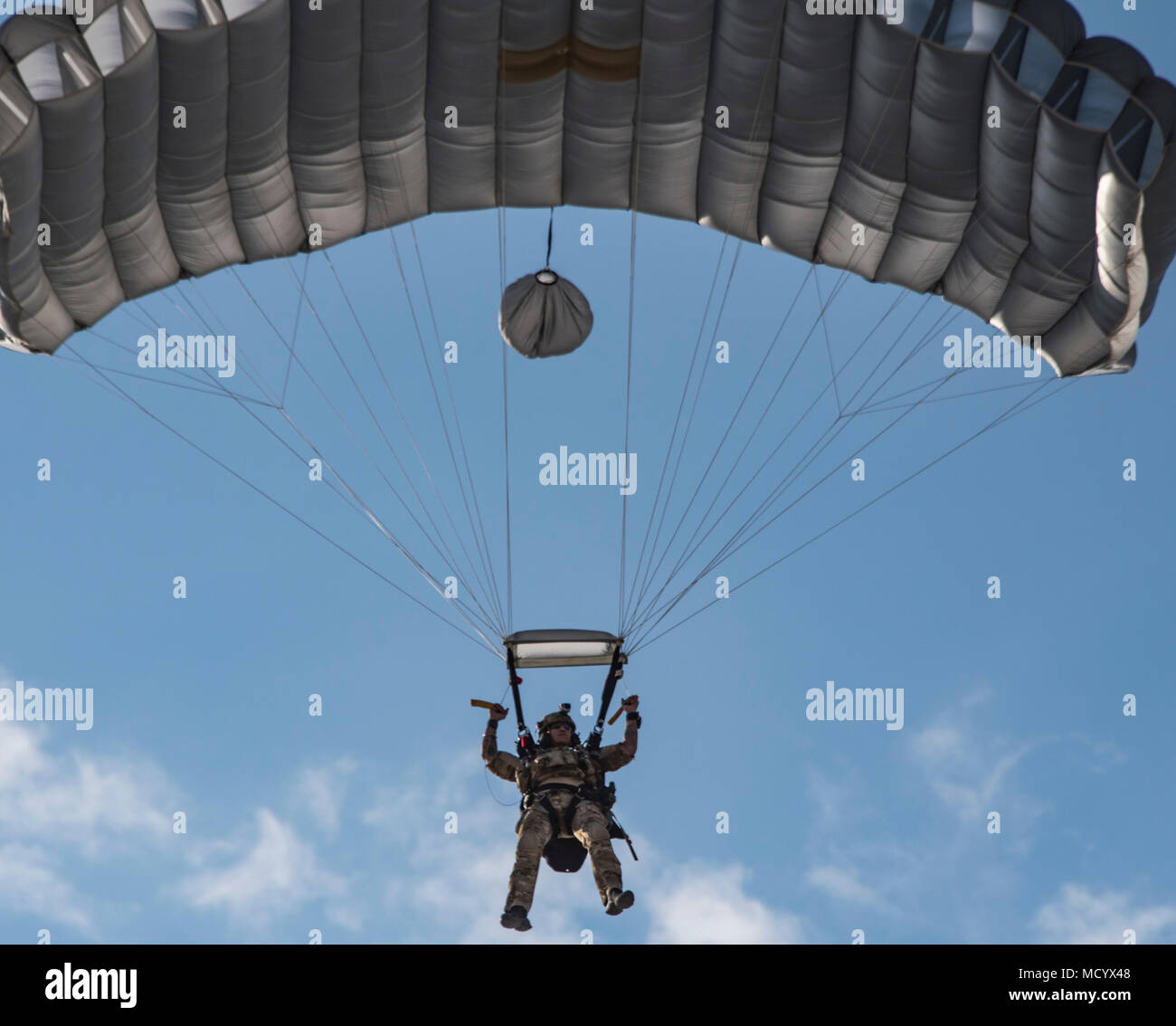 A U.S. Air Force pararescueman assigned to the 83rd Expeditionary ...