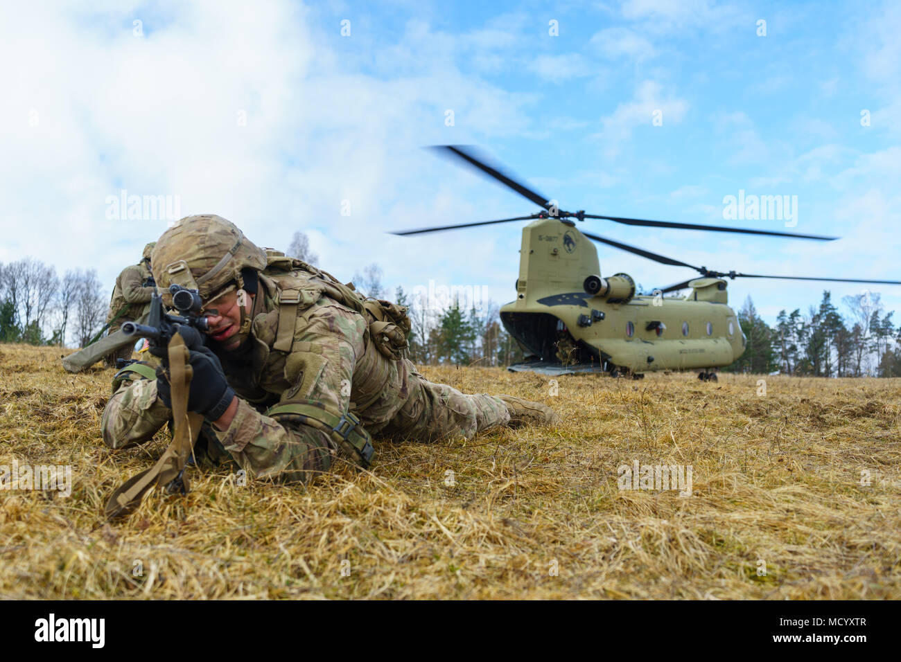 A cannon crewmember with Battery B, Field Artillery Squadron, 2nd ...