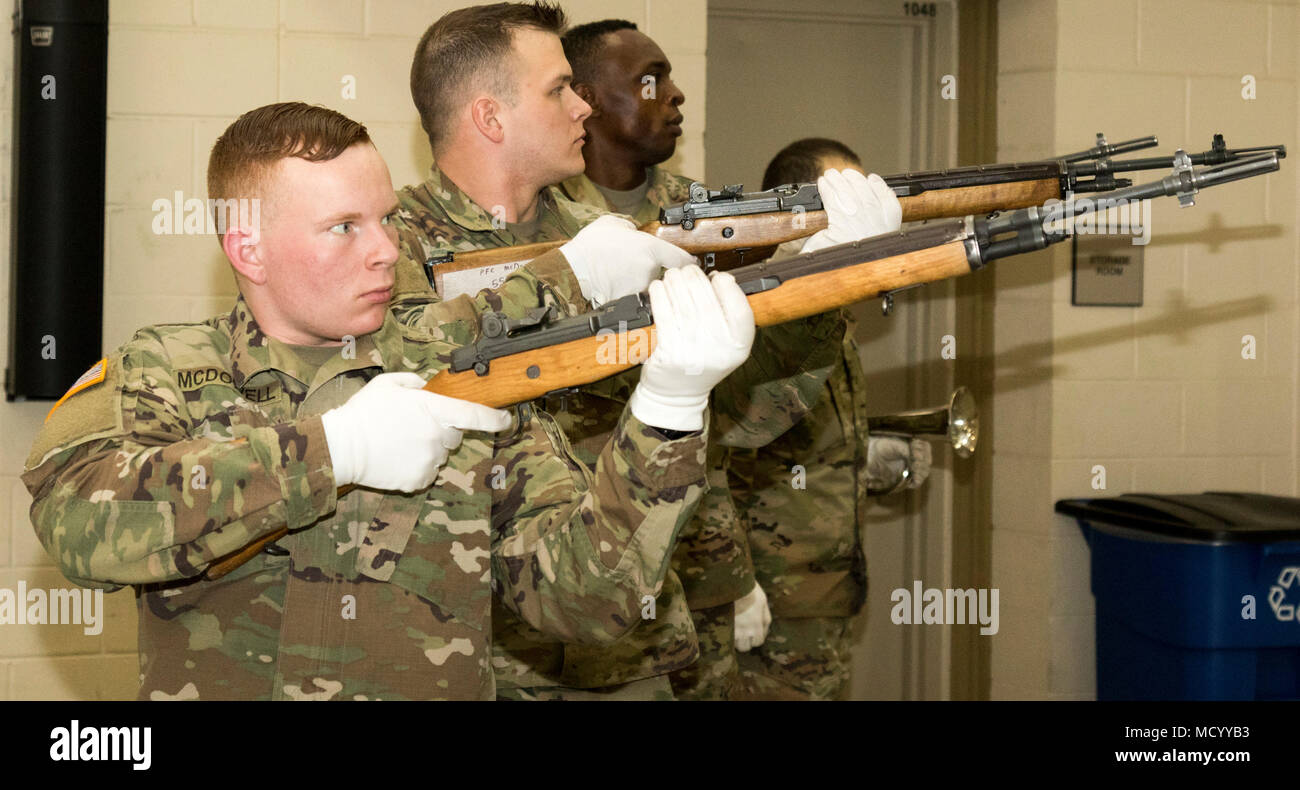 New York Army National Guard Soldiers practice firing a funeral salute ...