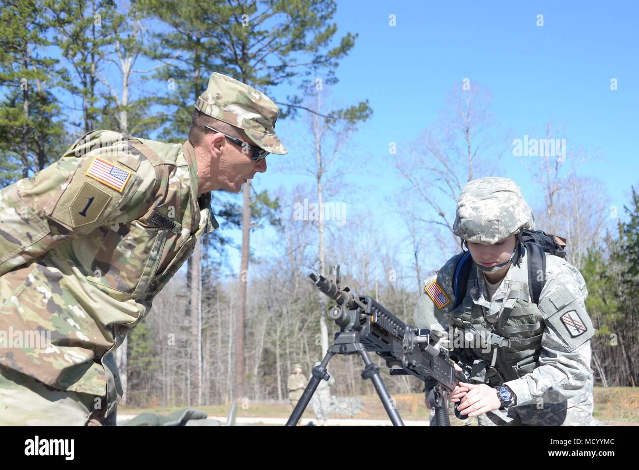 Spc. Angela Ruiz, 113th Sustainment Brigade, is tested on weapons ...