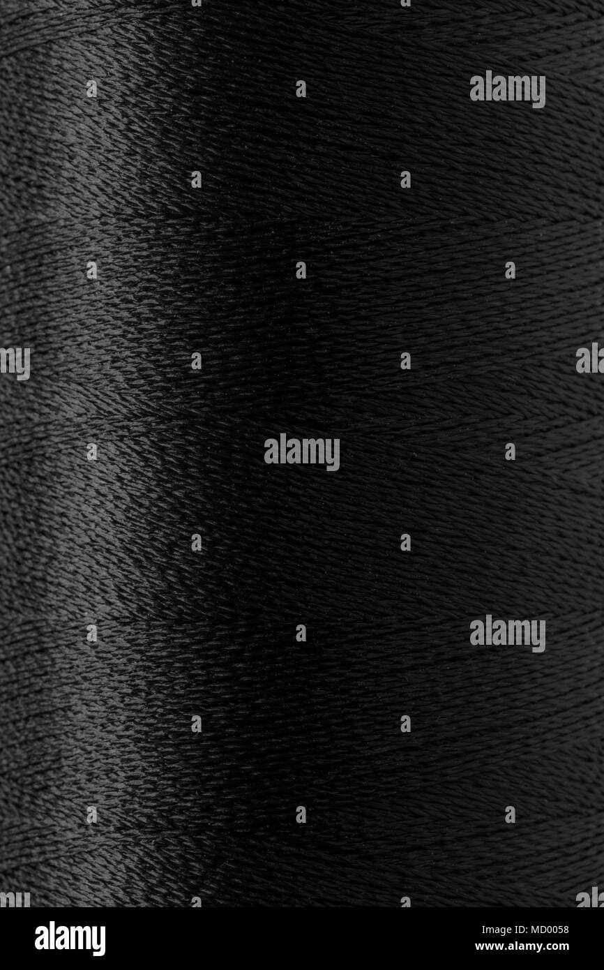 The surface of the black thread roll Stock Photo - Alamy