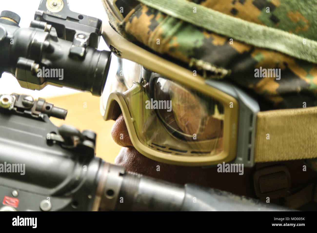 A U.S. Marine with 1st Battalion, 3d Marine Regiment sights in on his ...