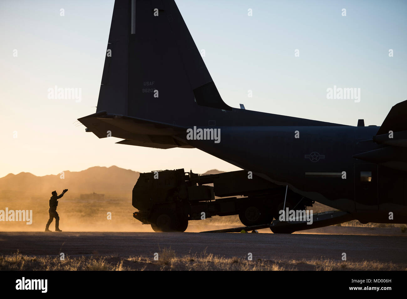 An MC-130J Commando II loadmaster, assigned to the 9th Special ...