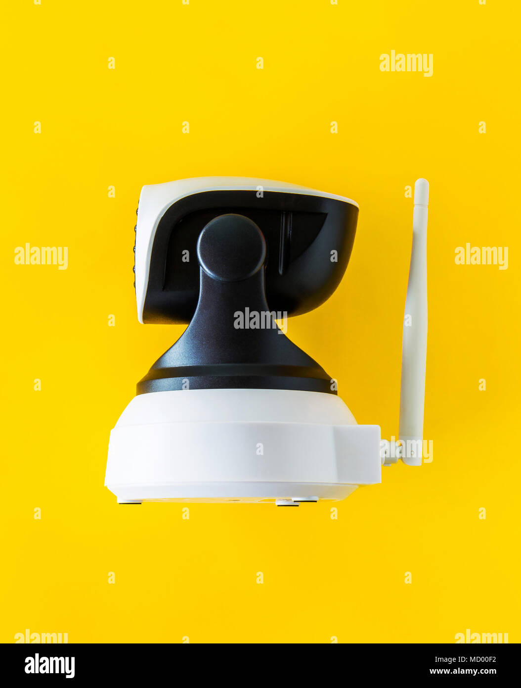 CCTV on yellow background Stock Photo - Alamy