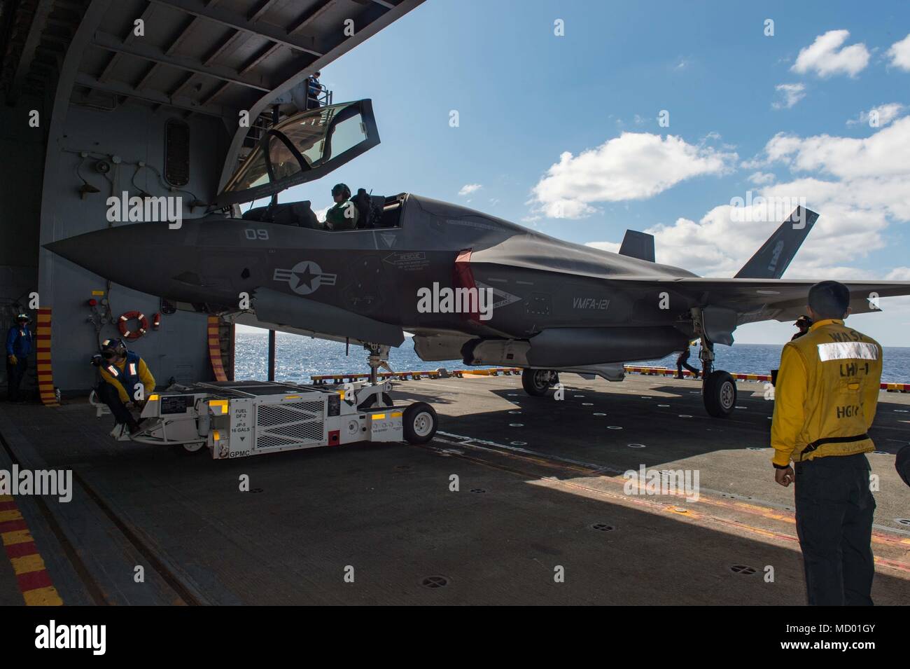 180311-N-XB010-0005 EAST CHINA SEA (March 11, 2018) Sailors move an F ...