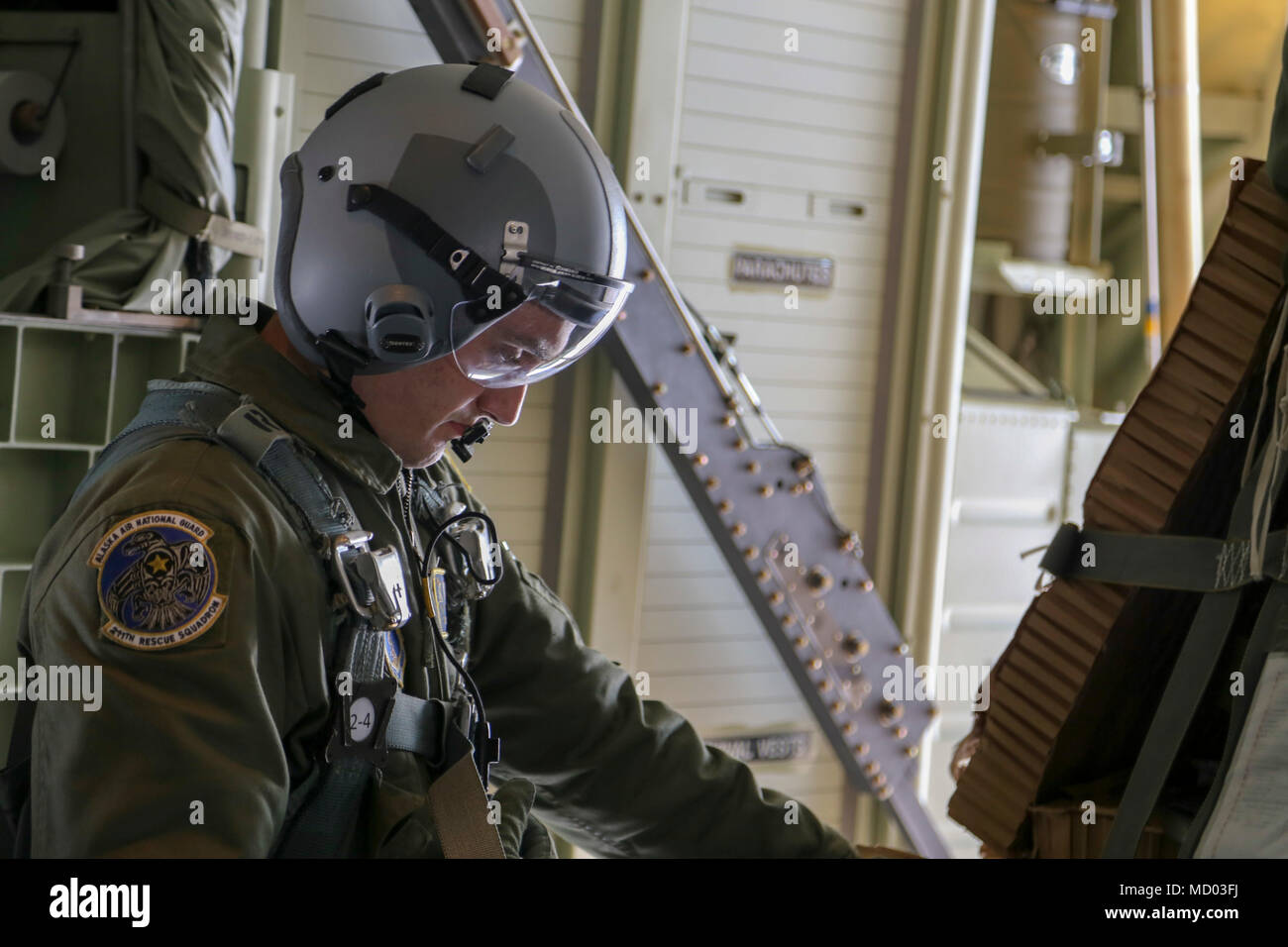 Alaska Air National Guard Staff Sgt. Alan Cordell, a loadmaster with ...