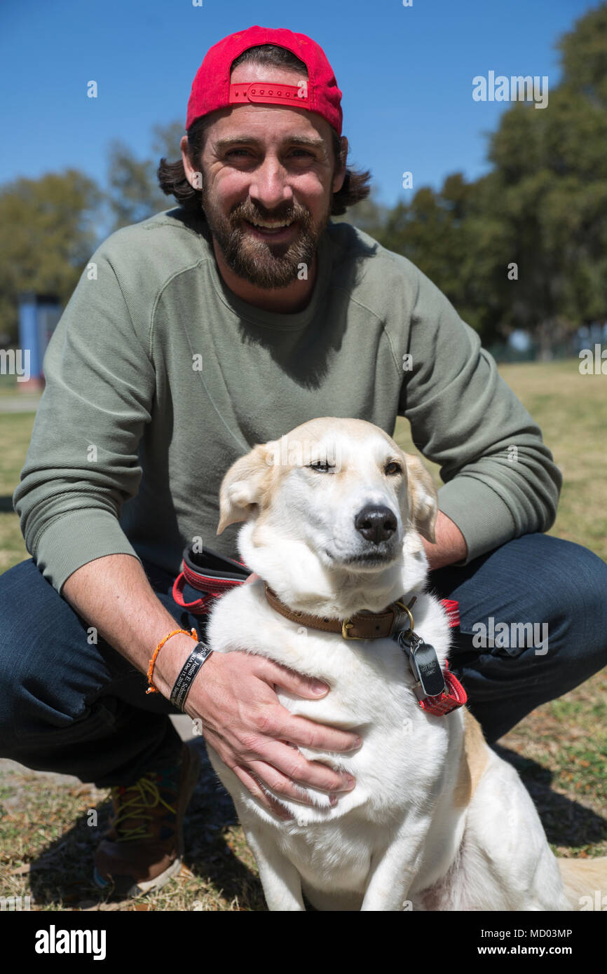 Craig Grossi, Marine veteran, poses with his dog, Fred, March 9, 2018 ...