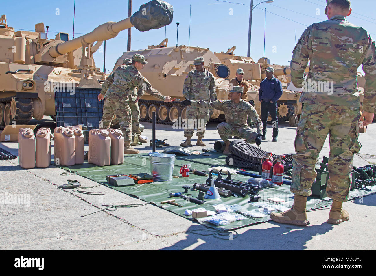 Cannon crew members from Battery B, 1st Battalion, 9th Field Artillery ...