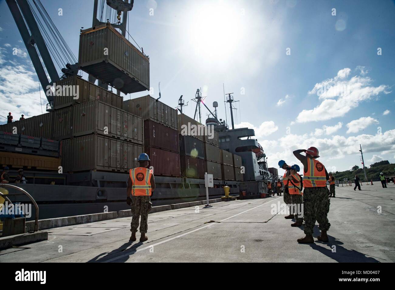 Sailors assigned to Navy Cargo Handling Battalion (NCHB) 1 Det. Guam ...
