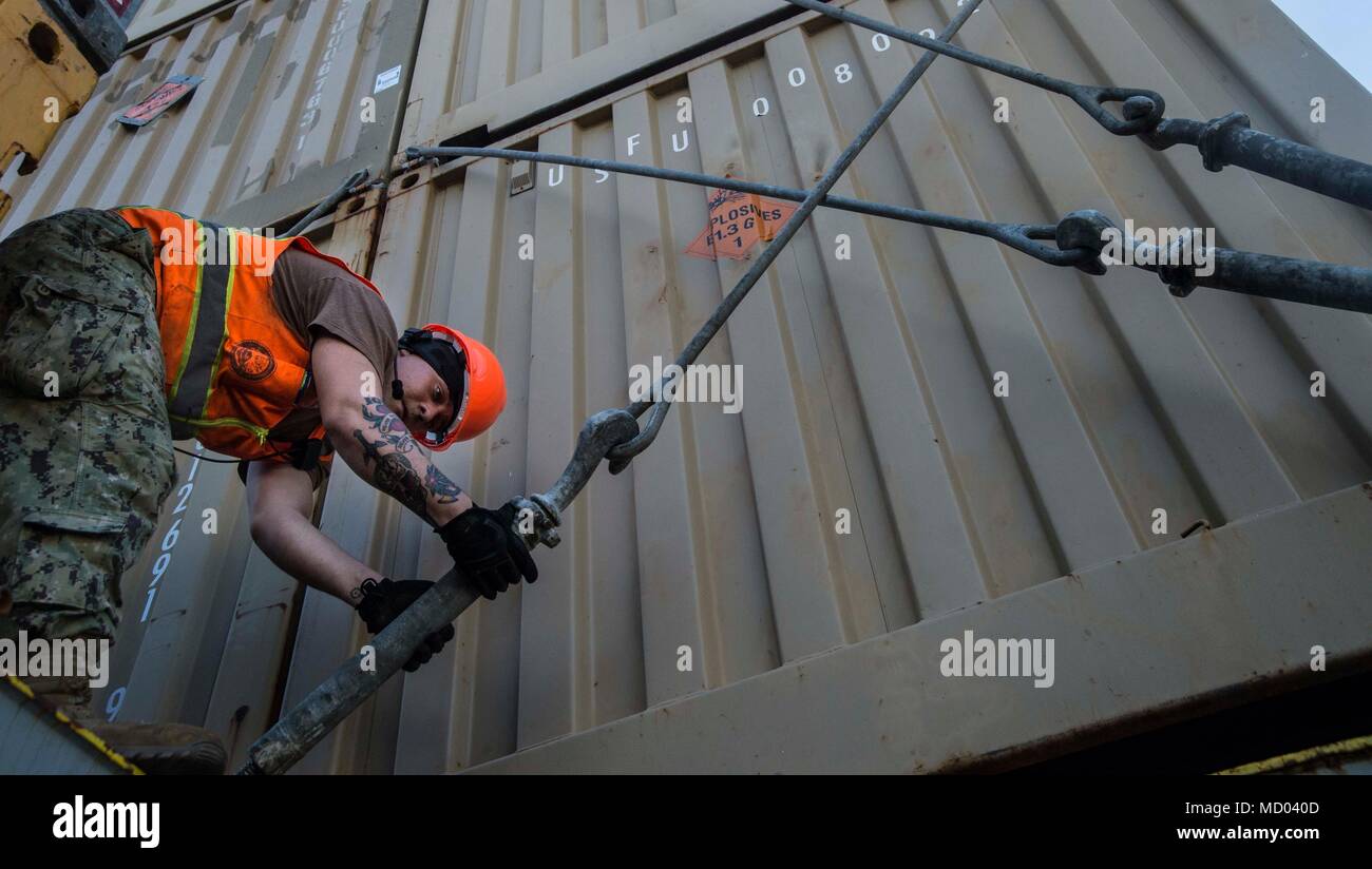 Builder 2nd Class Brian Ruhl, assigned to Navy Cargo Handling Battalion ...