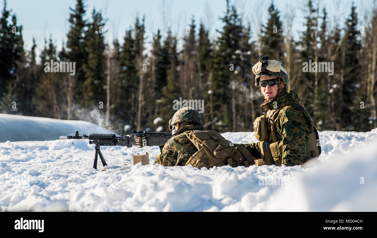 U.S. Marine Corps Pfc. Gerald W. Carr, left, and Cpl. Connor D. Reinsch ...