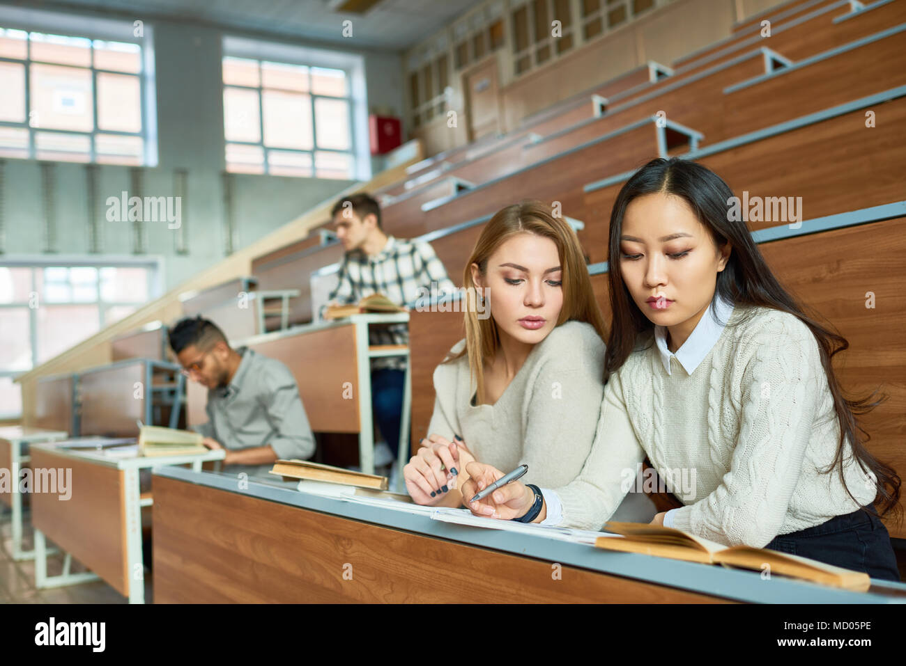 Group of Modern Students at College Stock Photo - Alamy