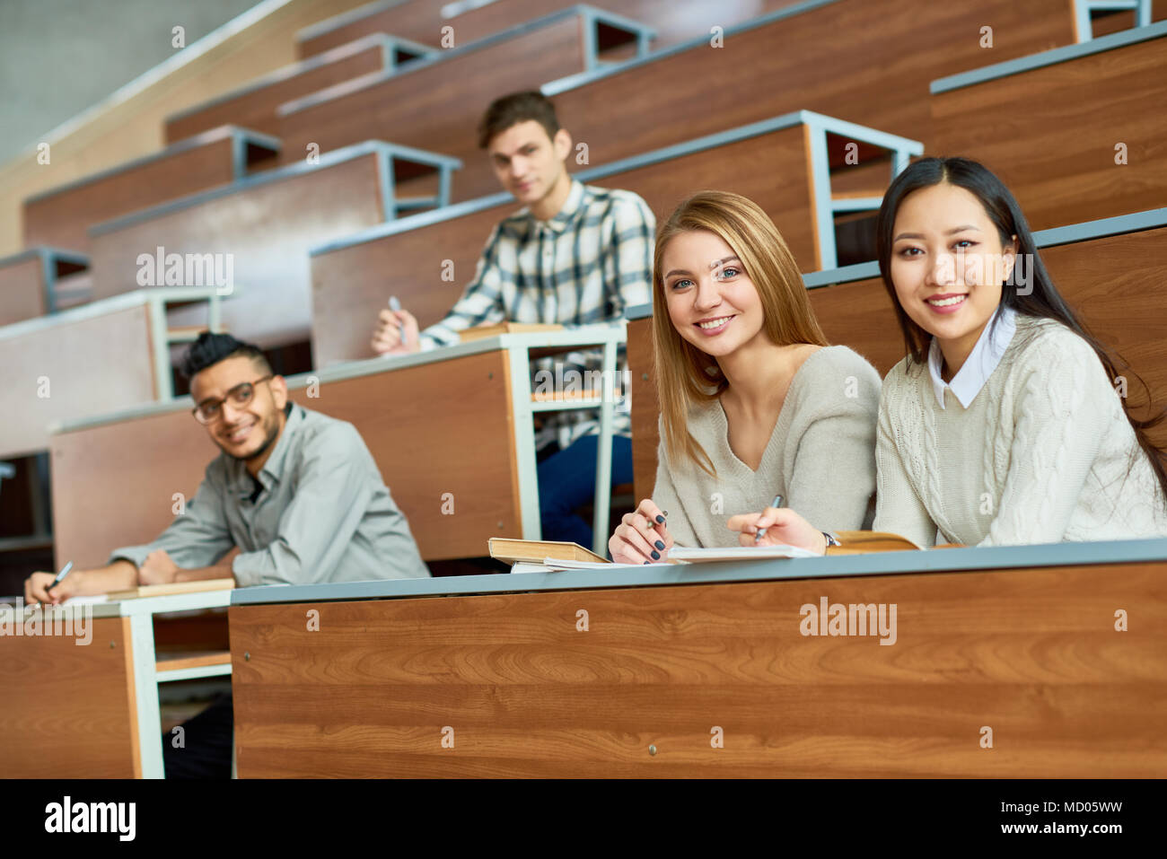 Happy Students in College Stock Photo - Alamy