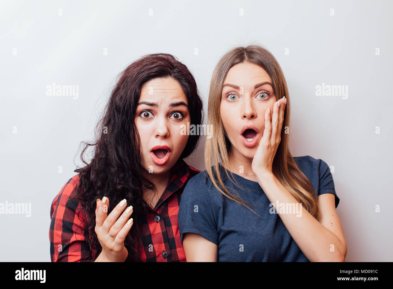 girls are surprised Stock Photo - Alamy
