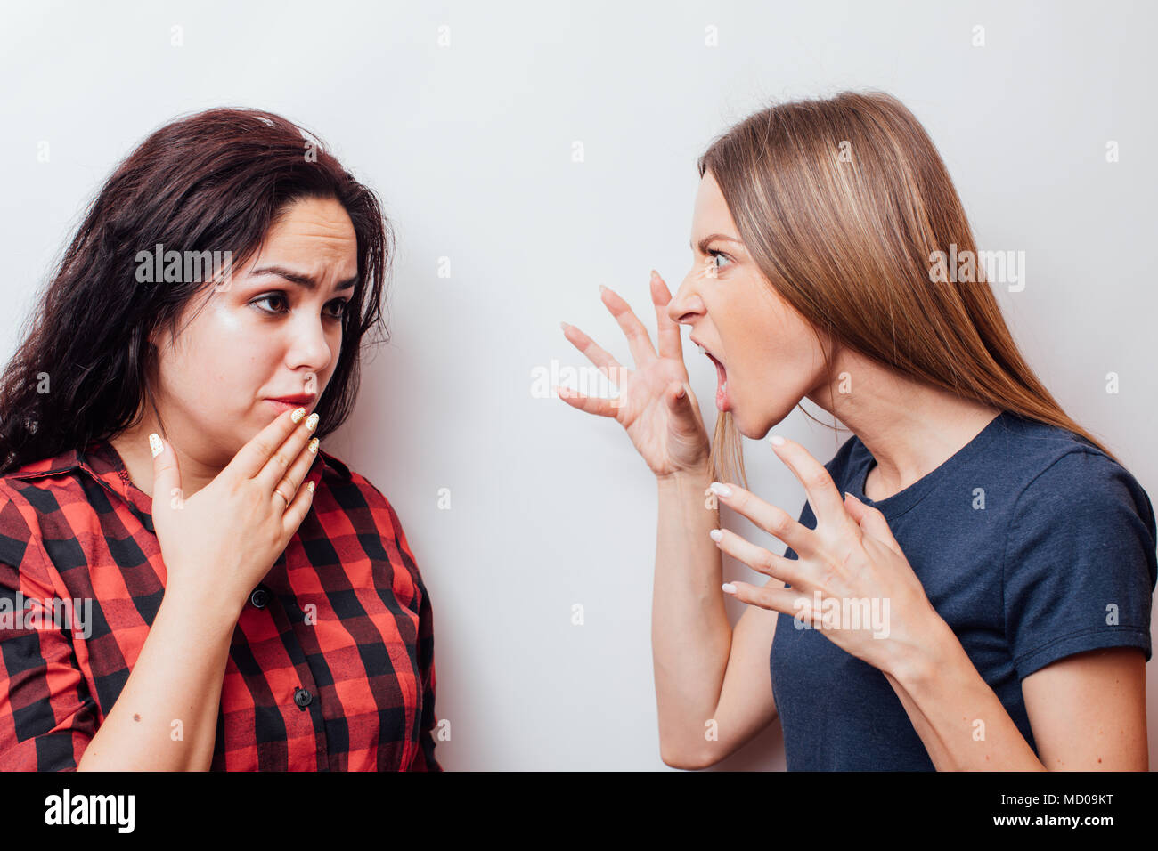 Screaming, hate, rage. Emotional, young face. Female half-length ...