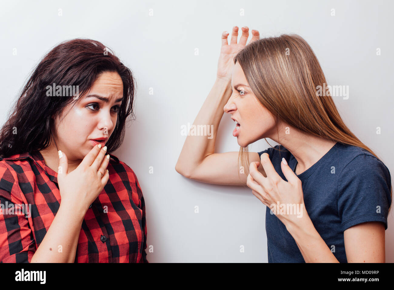 Screaming, hate, rage. Emotional, young face. Female half-length ...