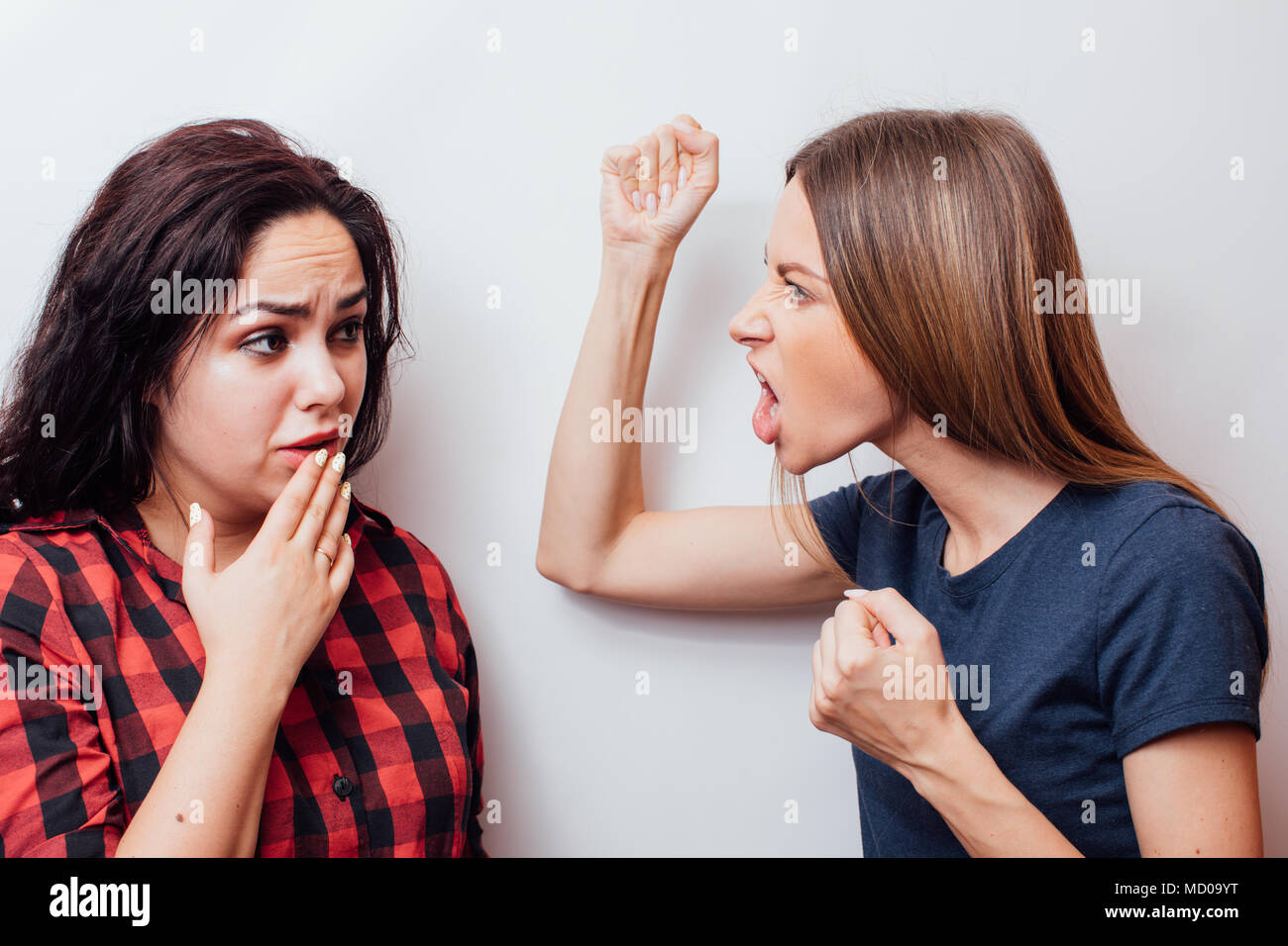 Screaming, hate, rage. Emotional, young face. Female half-length ...