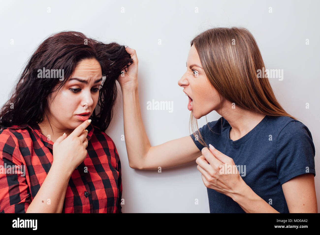 Screaming, hate, rage. Emotional, young face. Female half-length ...