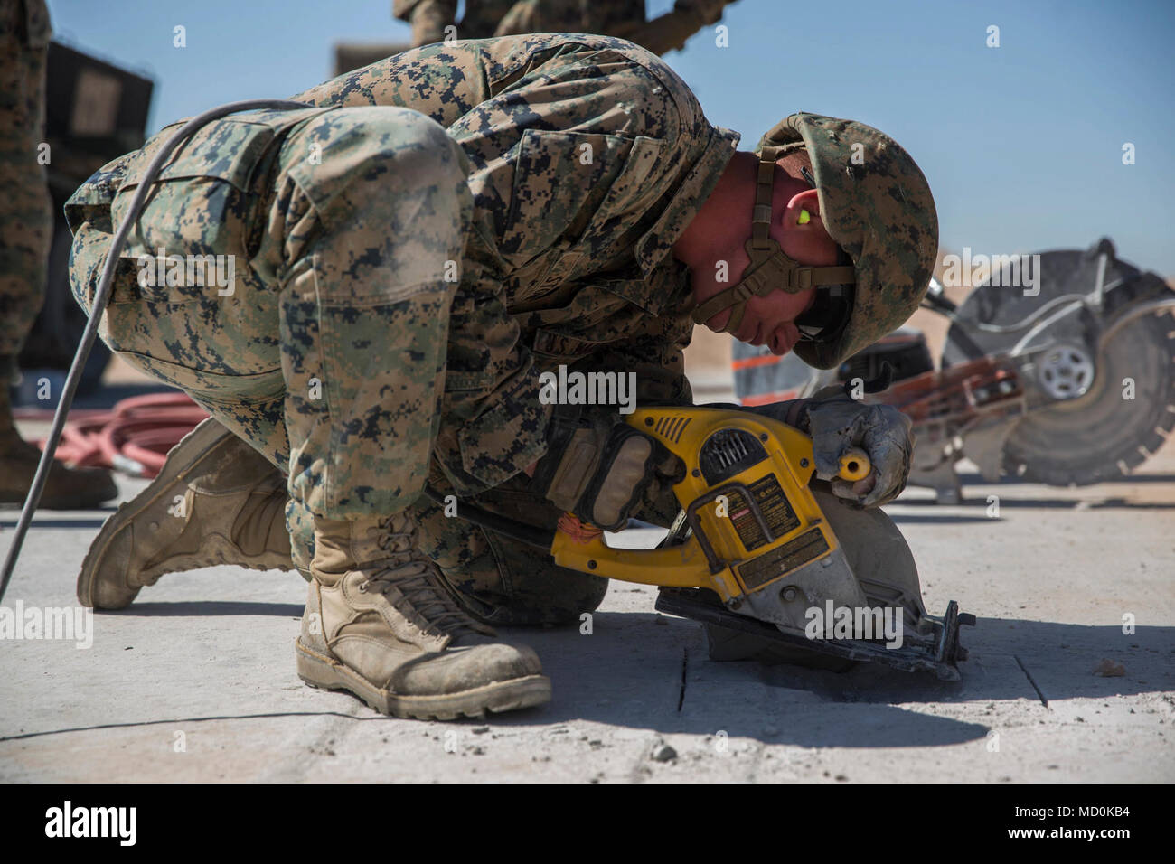 Sgt. Garry Stone, a Marine Wing Support Squadron 272 combat engineer ...