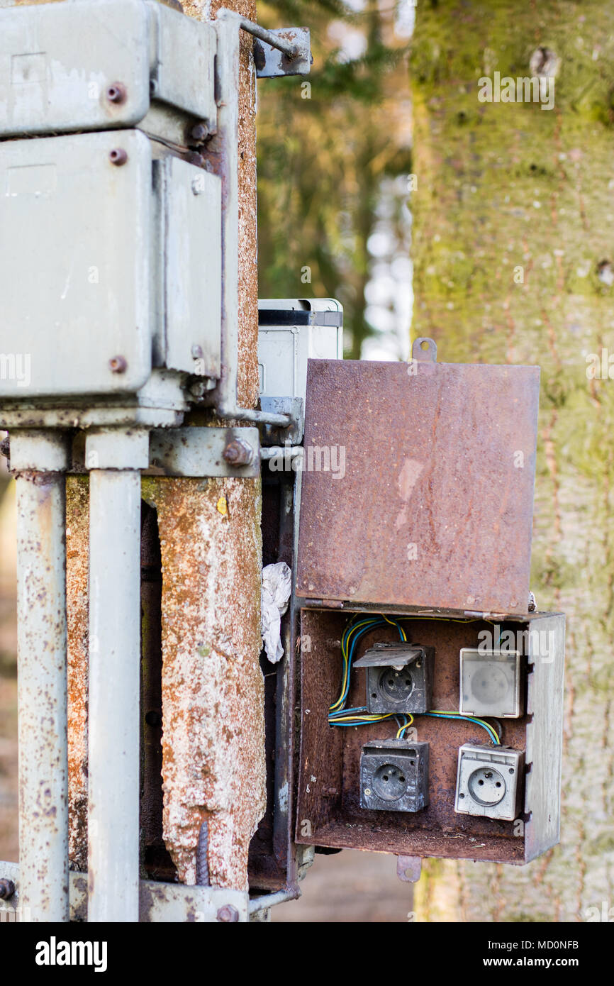 Old box used for electrical installations. Space for wires and electric ...