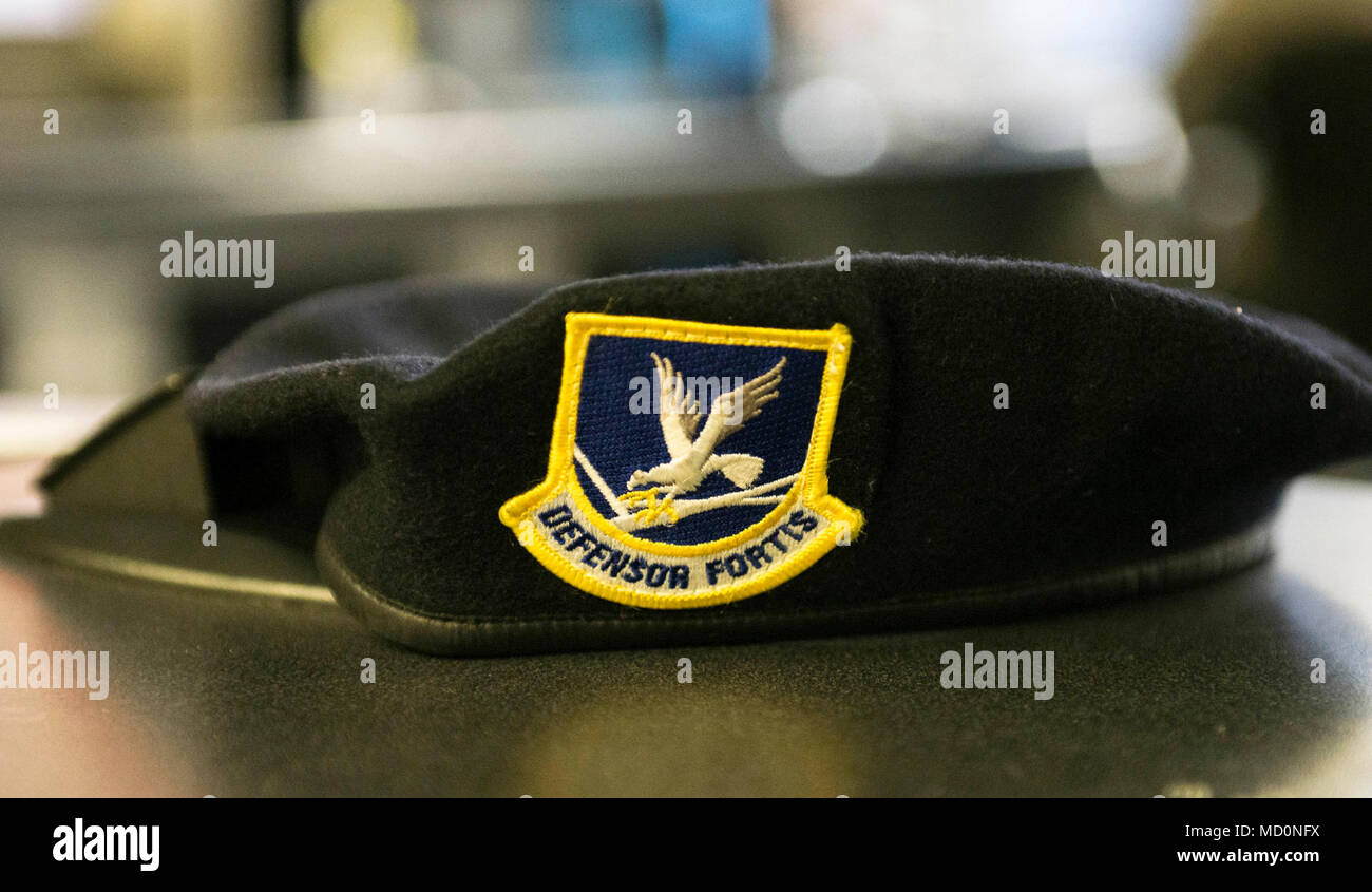 An 18th Wing Security Forces Squadron beret sits on a table March 29 ...