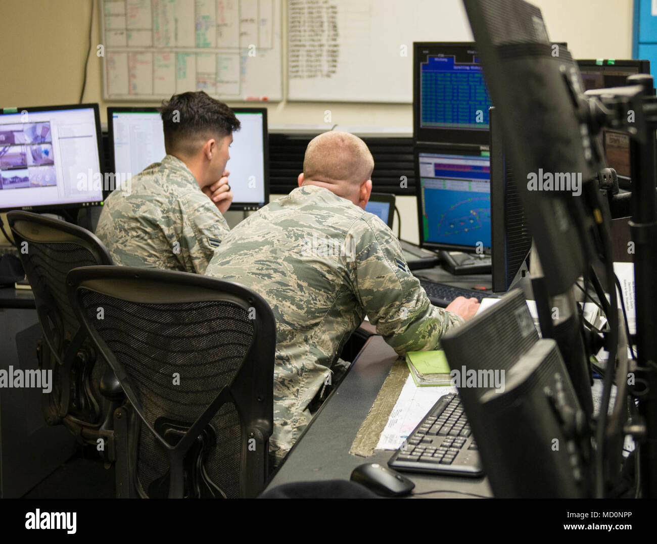 Members from the 18th Wing Security Forces Squadron work as alarm ...