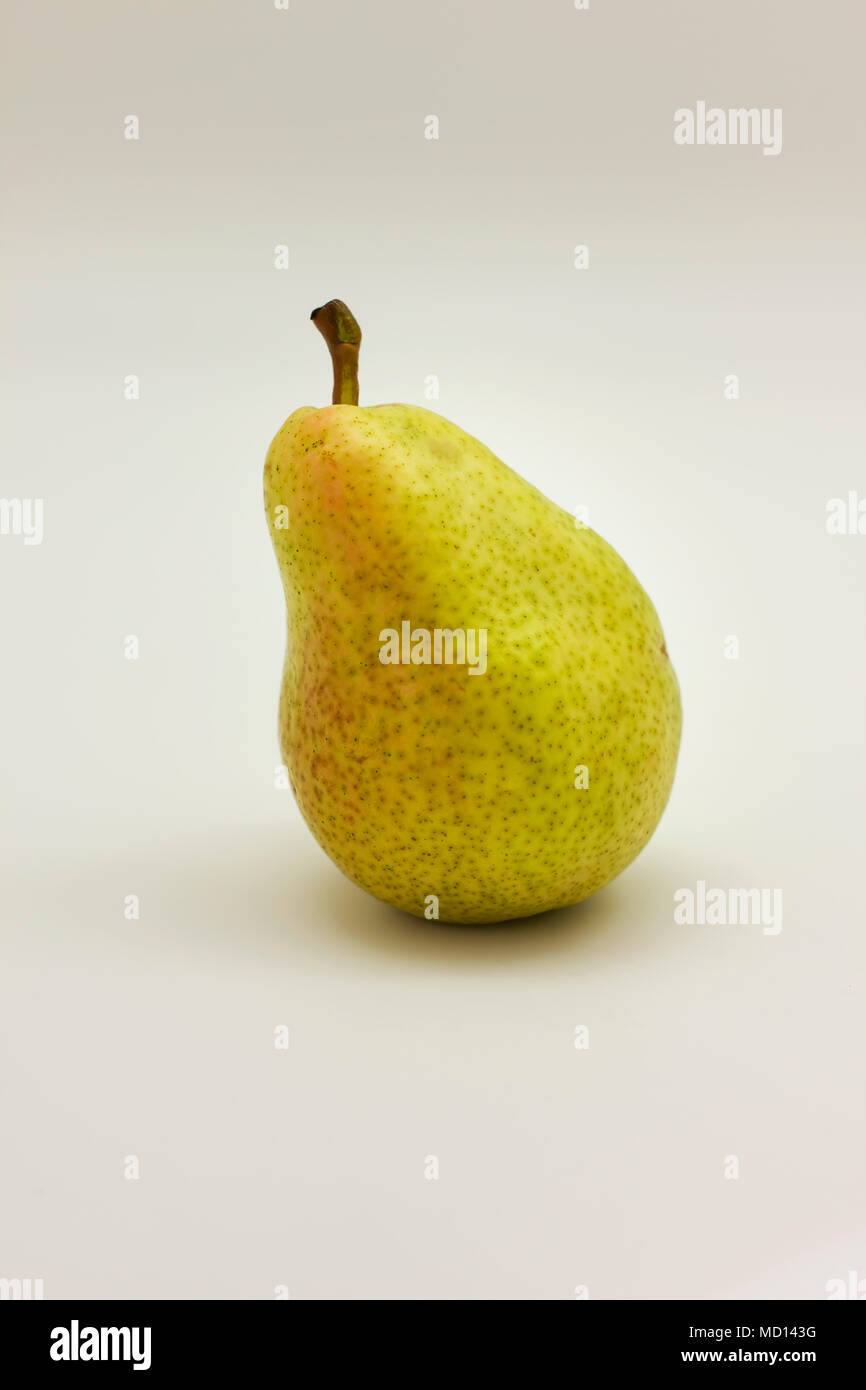 Yellow ripe pear isolated on white background Stock Photo - Alamy
