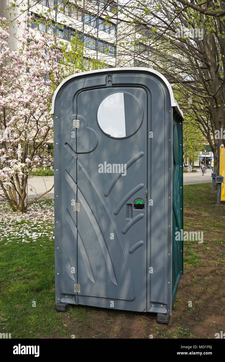 Portable toilet in the park Stock Photo - Alamy