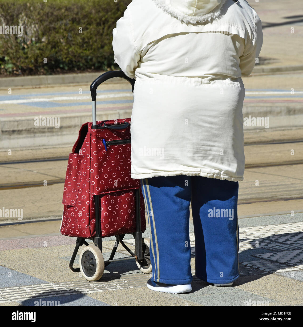 Old woman stands hi-res stock photography and images - Alamy