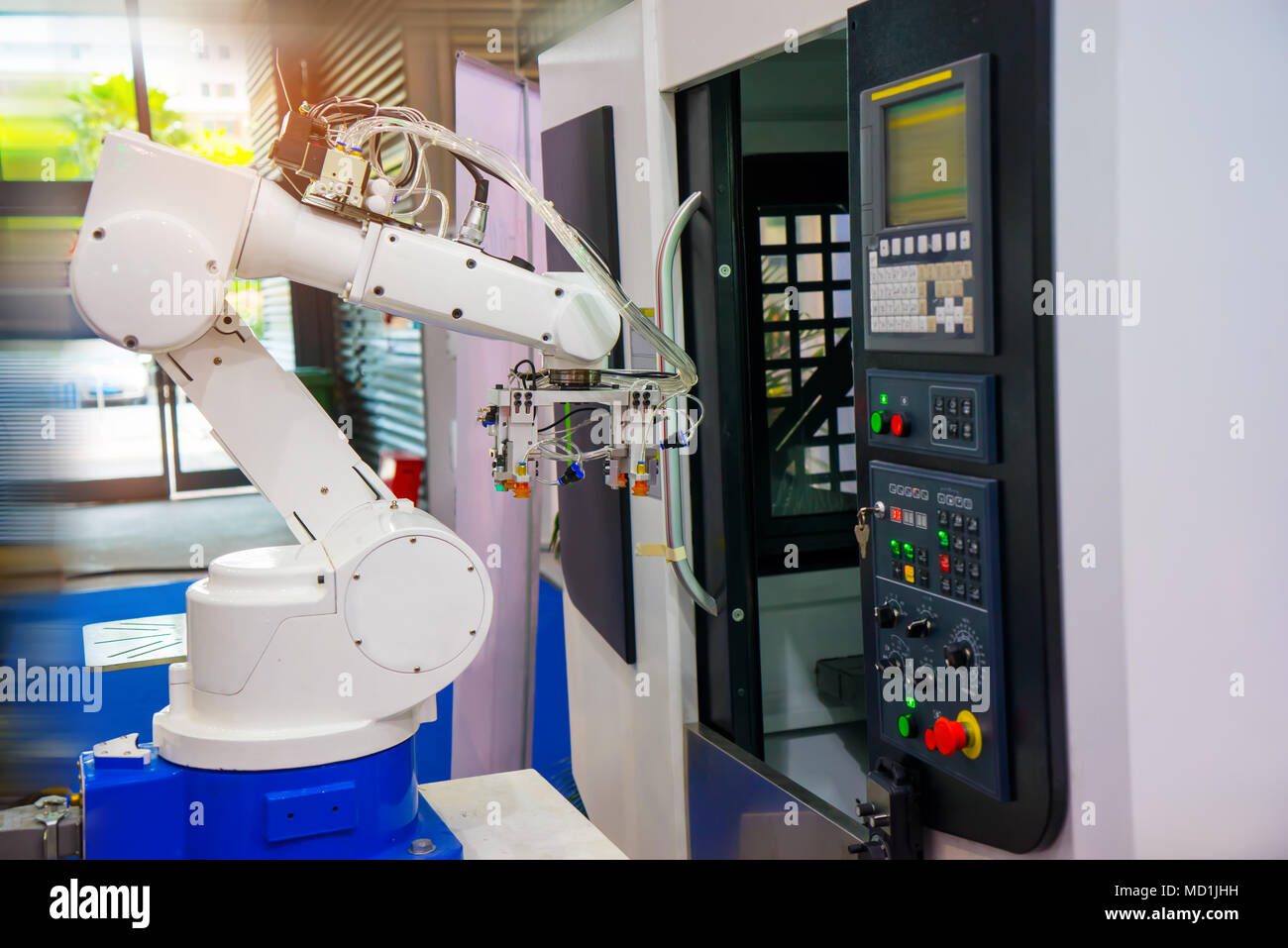 robotic hand machine tool at industrial manufacture factory Stock Photo ...