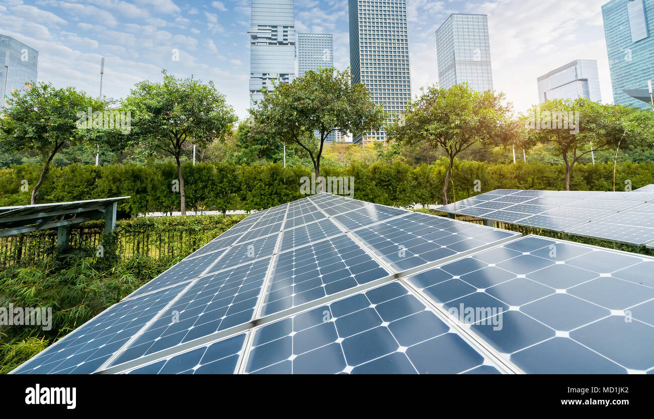 Solar Panels In The Park Of Modern City Stock Photo - Alamy