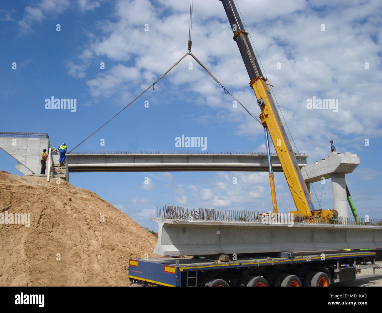 Crane fixed the beam Stock Photo - Alamy