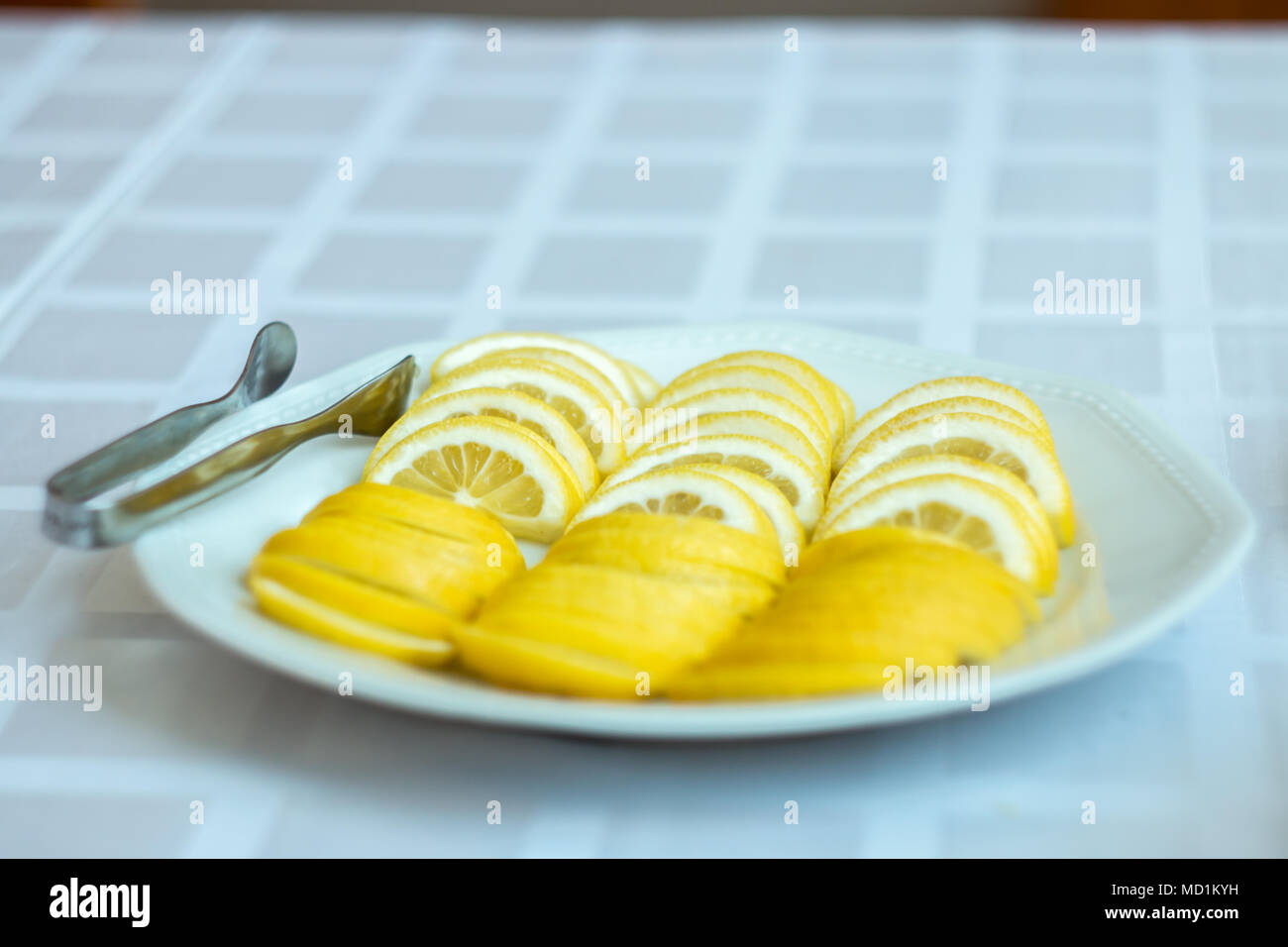Lemon wedge white background hi-res stock photography and images - Alamy