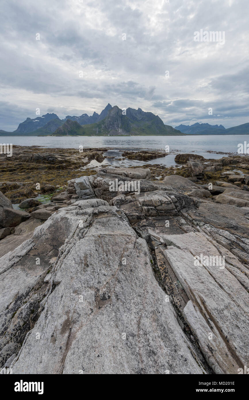 Village of Flakstad seen from across the fjord, Lofoten Islands ...