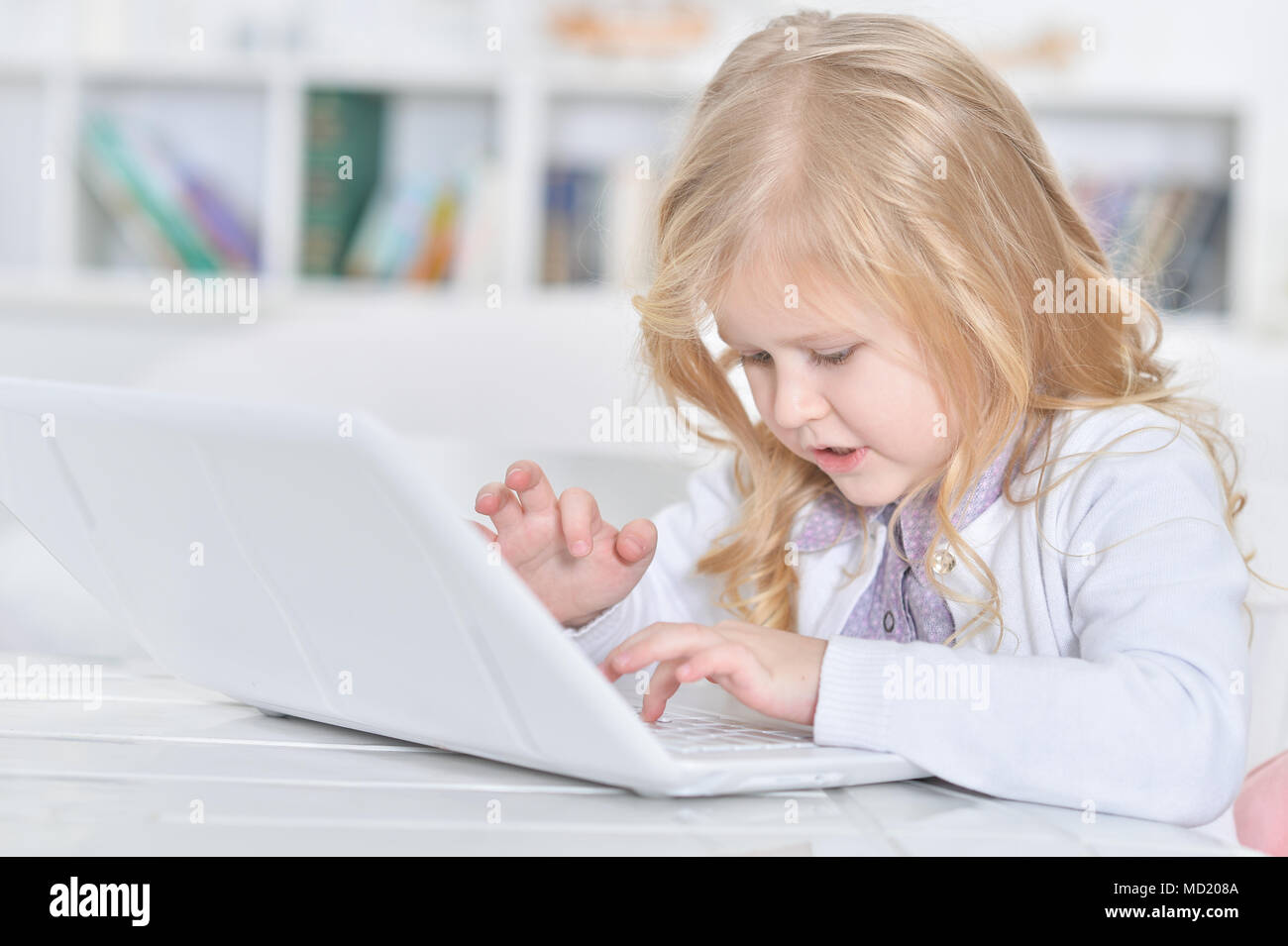 Little girl using laptop Stock Photo - Alamy Little girl using laptop Stock Photo - Alamy