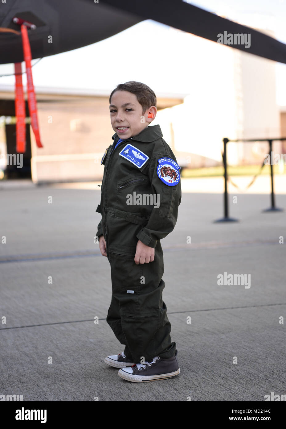 Ethan Ibi, pilot for a day, poses for his picture March 9, 2018, at ...
