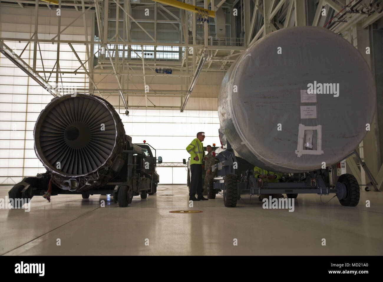 A KC-135 Stratotanker engine sits to the left of a KC-46 Pegasus engine ...
