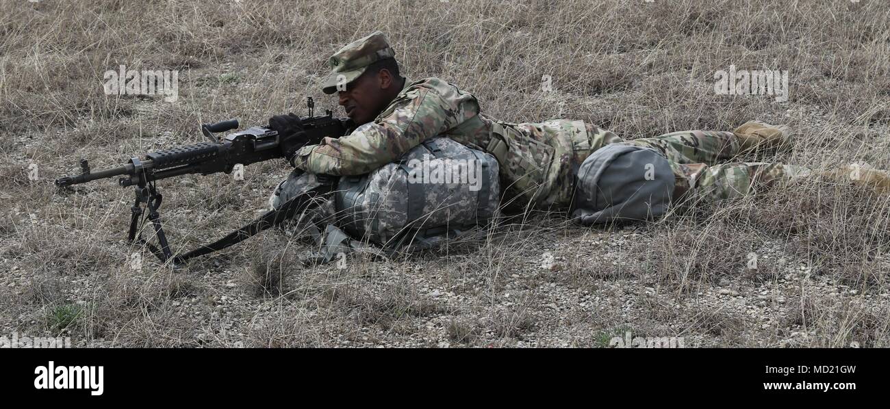 A soldier pulls security at one of the six stations each team had to ...
