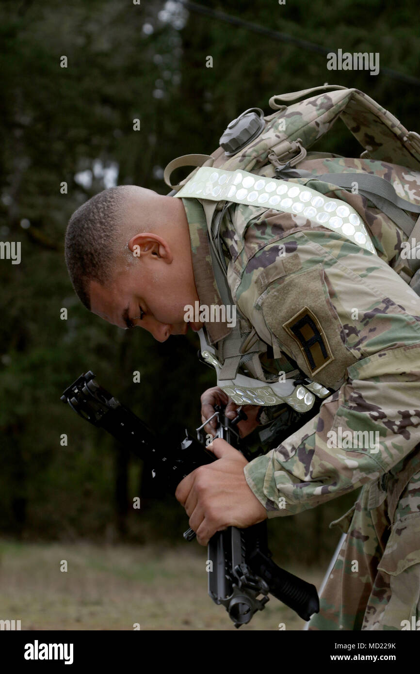 Staff Sgt. Colby Robertson, a multiple launch rocket system crewmember ...