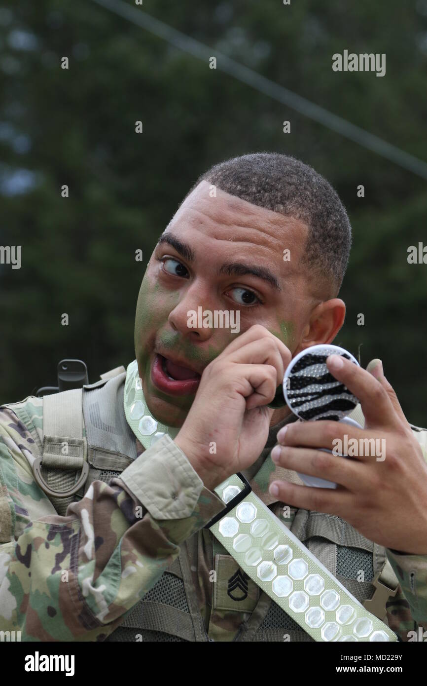 Staff Sgt. Colby Robertson, a multiple launch rocket system crewmember ...