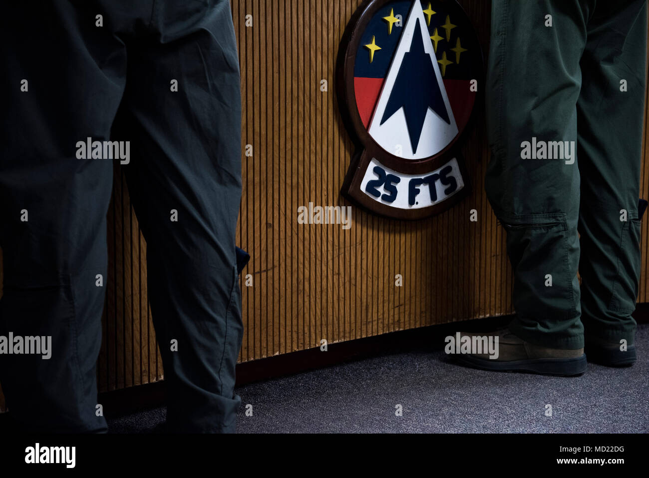 Pilots with the 25th Flying Training Squadron (FTS) bus out to their ...
