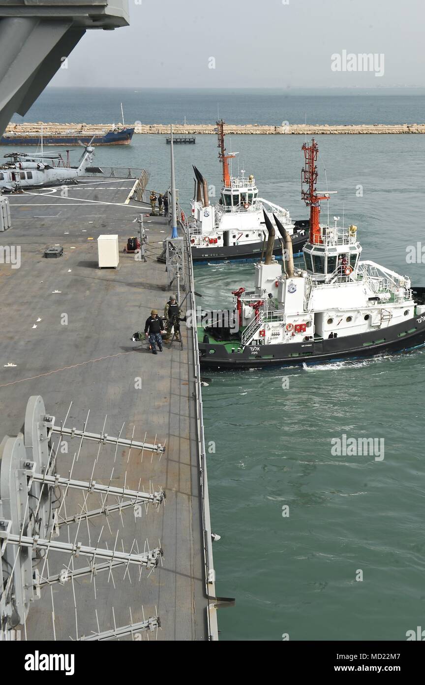 180308-N-QR145-106 HAIFA, Israel (March 8, 2018) Tugboats push the Blue ...