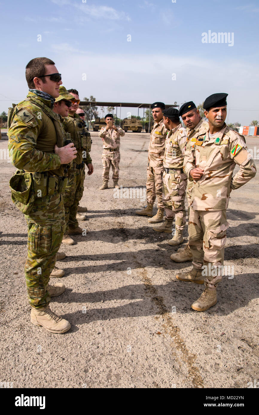 Australian soldiers, with Task Force Taji, and Iraqi soldiers, with the ...