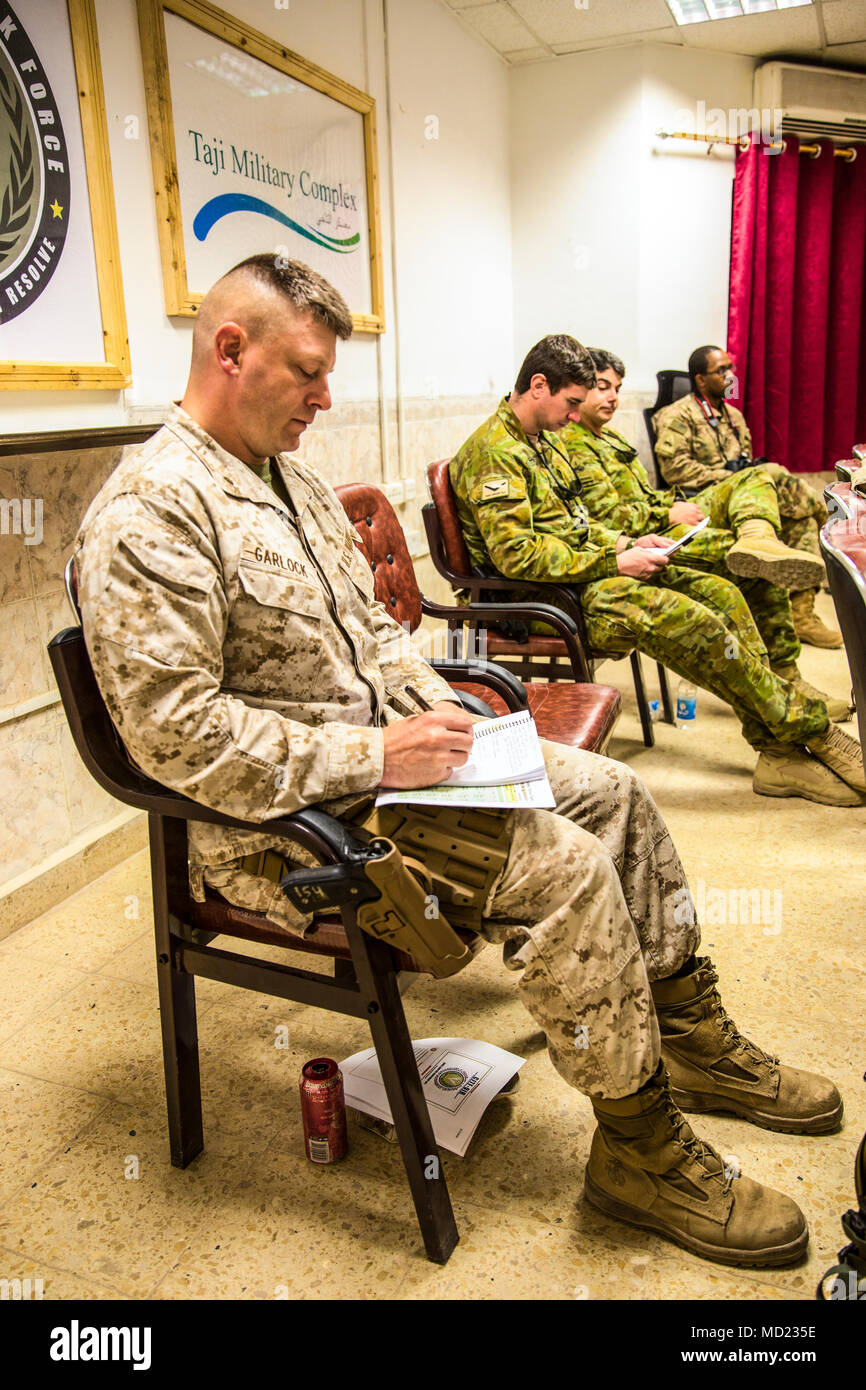 U.S. Marine Corps Maj. Troy Garlock takes notes during a Combined Joint ...