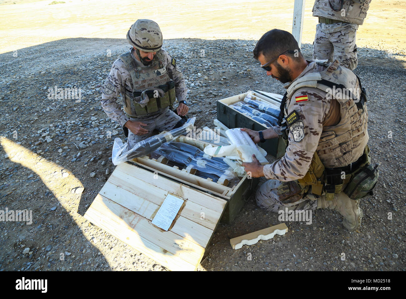 Spanish Army trainers prepare ammunition at the Besmaya Range Complex ...
