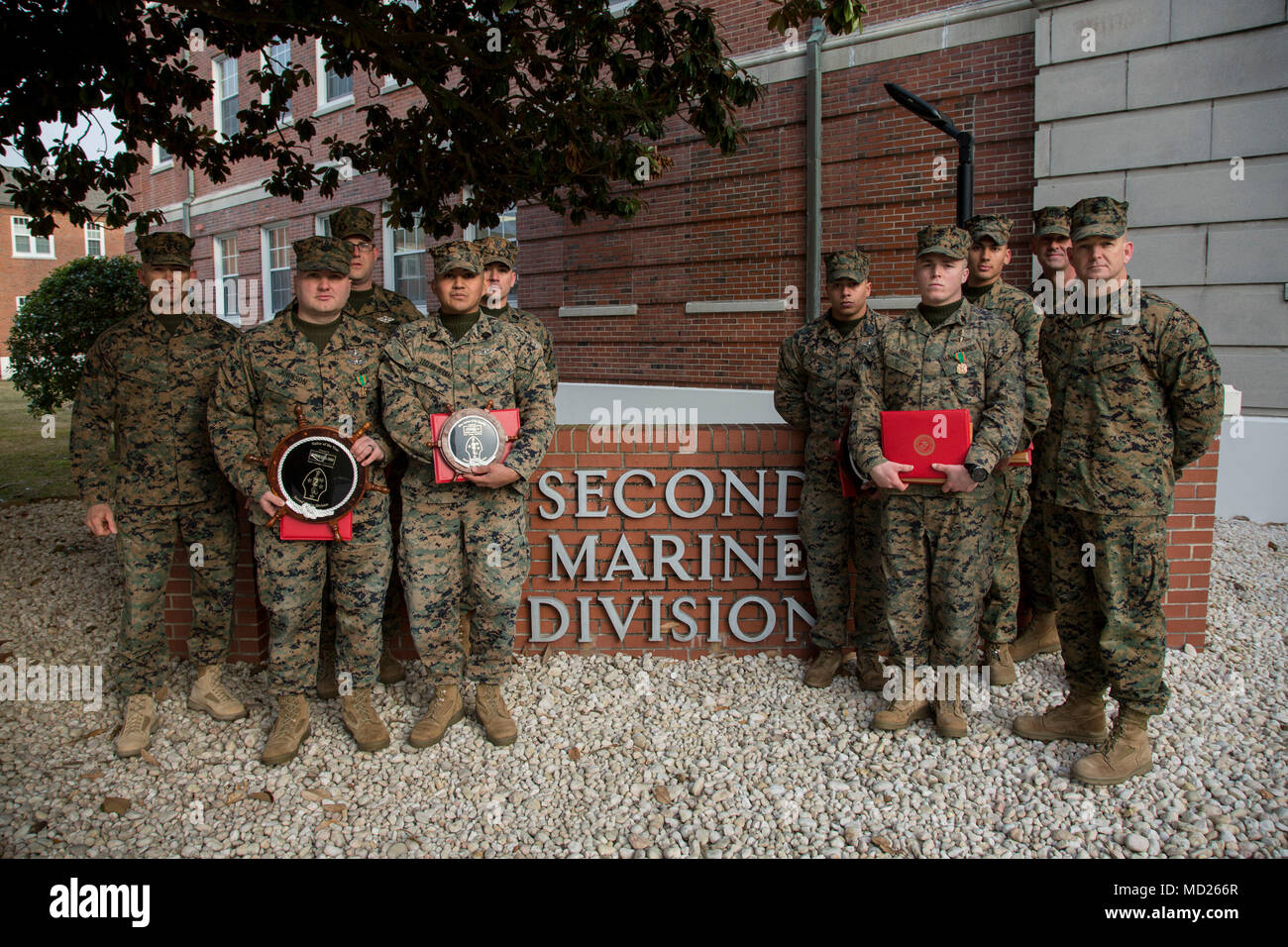 U.S. Marines and Sailors with 2nd Marine Division (2d MARDIV), pose ...