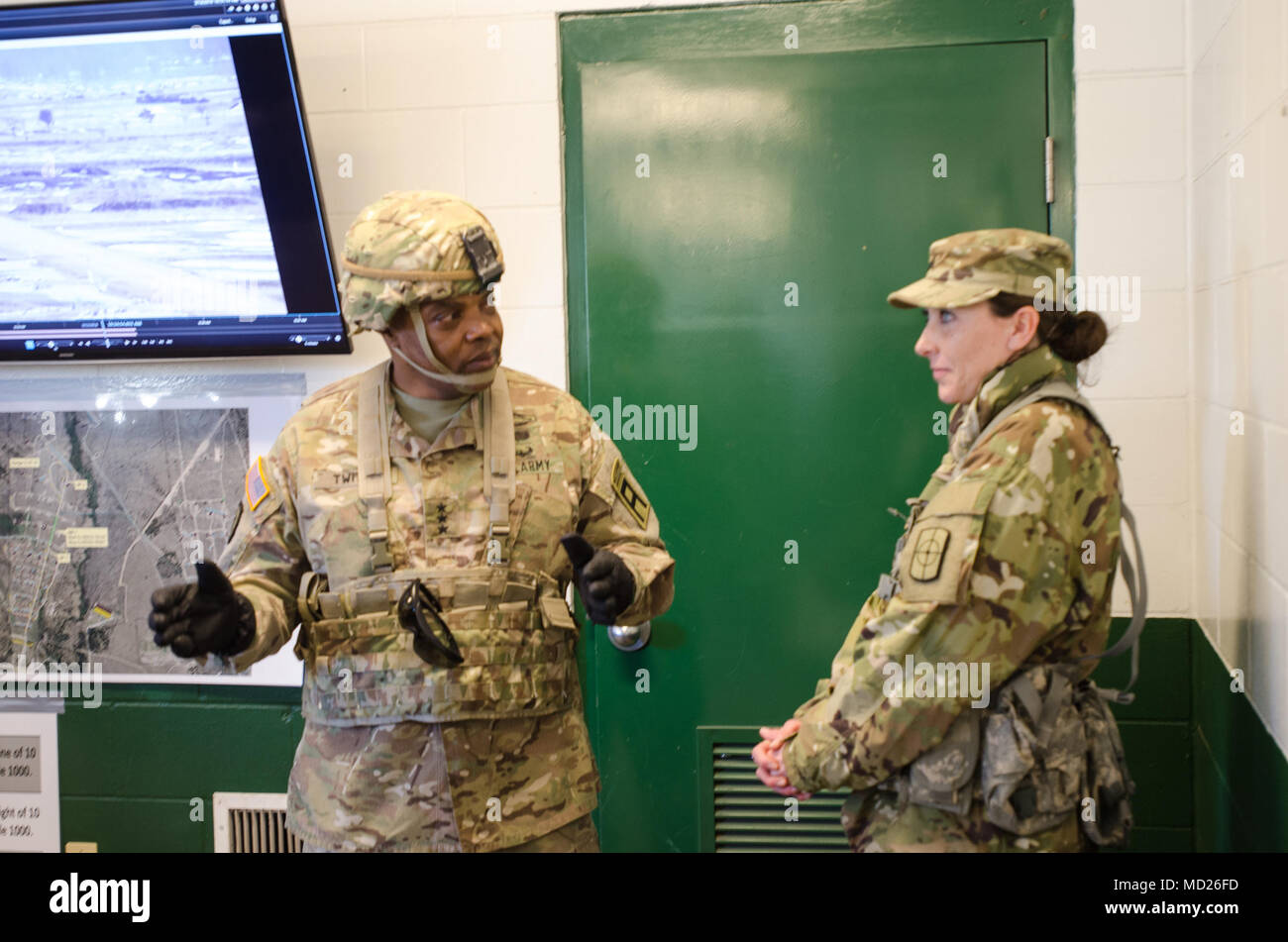 Lt. Gen. Stephen Twitty, commanding general, First Army, speaks with a ...