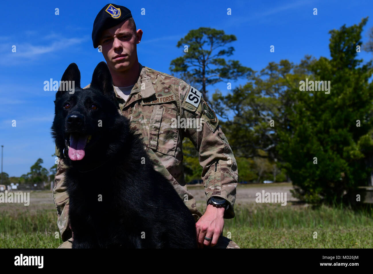 U.S. Air Force Staff Sergeant Daniel Smith and his partner, Max, are ...