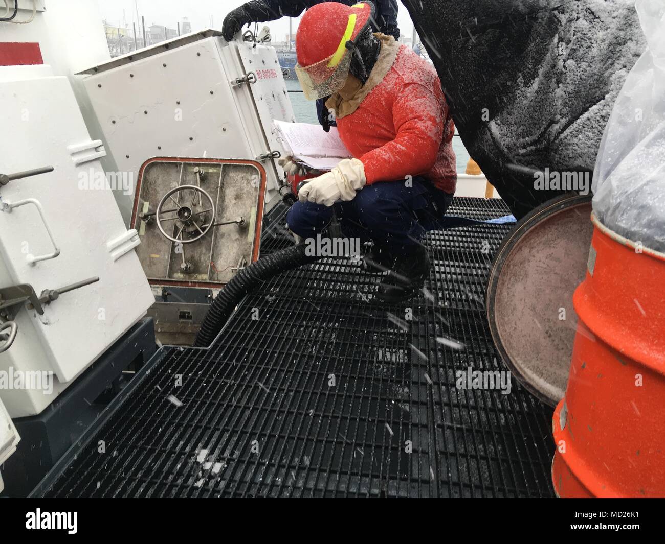 Coast Guard Cutter Naushon (WPB 1311) crew members conduct firefighting ...